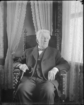 Man - Pose with a Cain in a Chair | Historic New England