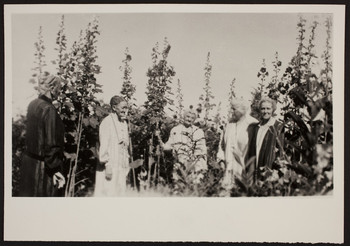 Group portrait of Marrett sisters and friends standing in the Marrett ...